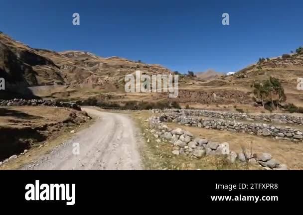Road trip in the Peruvian Andes. High altitude mountains trip by car ...