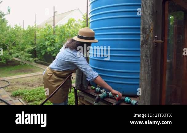 Collecting water in barrel Stock Videos & Footage - HD and 4K Video ...