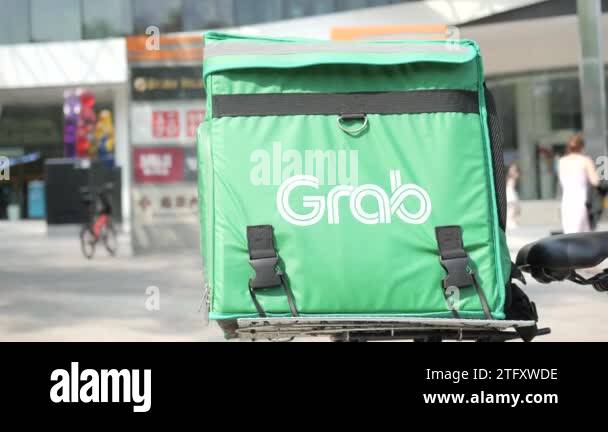 Grab food delivery app Stock Videos & Footage - HD and 4K Video Clips ...