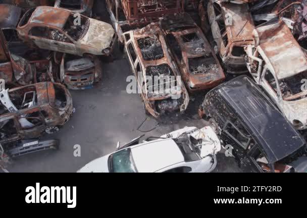 This stock video shows a dump of shot and burned cars in Irpin, Bucha ...