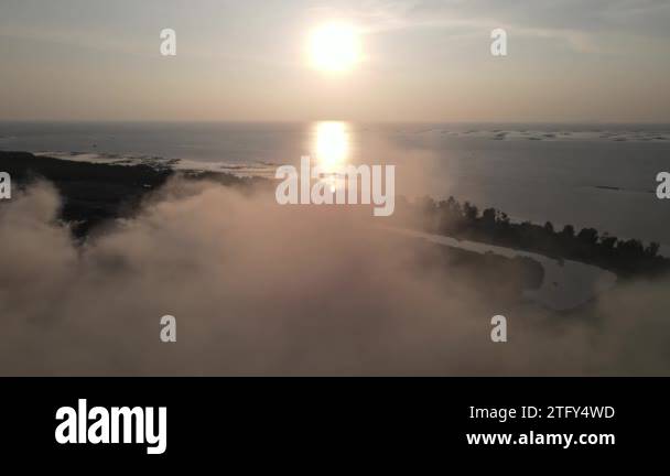 Silhouette smoke fume release from landfill site burning. Hazy and air ...