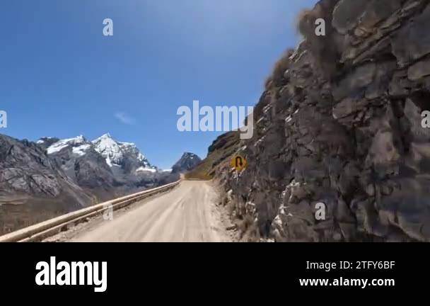 Road trip in the Peruvian Andes. High altitude mountains trip by car ...