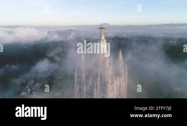 Drone moving closer to The statue of Jesus Christ in the Expiatory ...