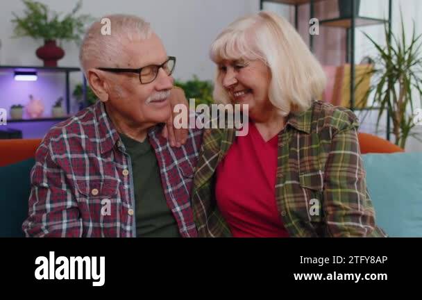 Happy senior elderly family couple grandparents man woman looking at ...