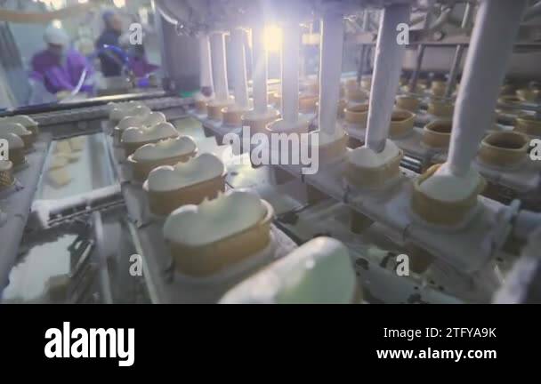 Automated production of ice cream. Automated ice cream production line ...