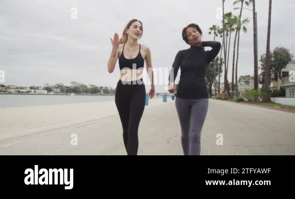 Two friends tired after their run together Stock Video Footage - Alamy