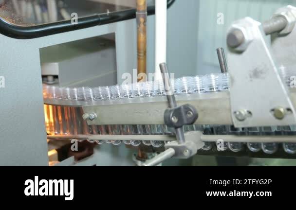 Production of plastic bottles.Automatic system. The production of ...