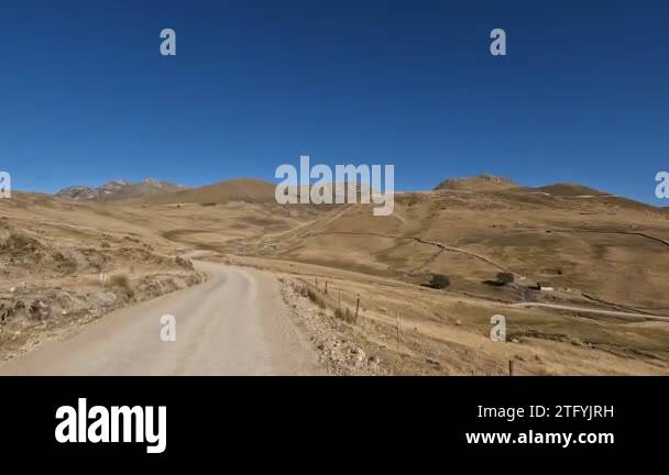 Road trip in the Peruvian Andes. High altitude mountains trip by car ...
