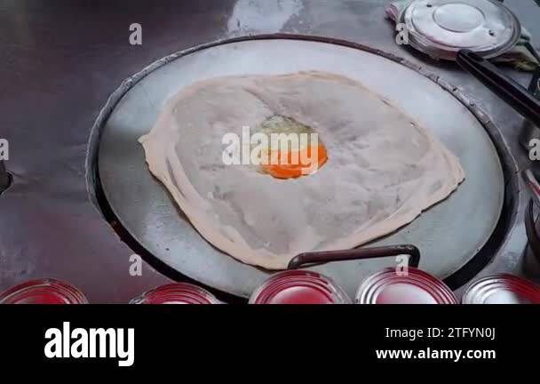 Crispy flour roti Stock Videos & Footage - HD and 4K Video Clips - Alamy