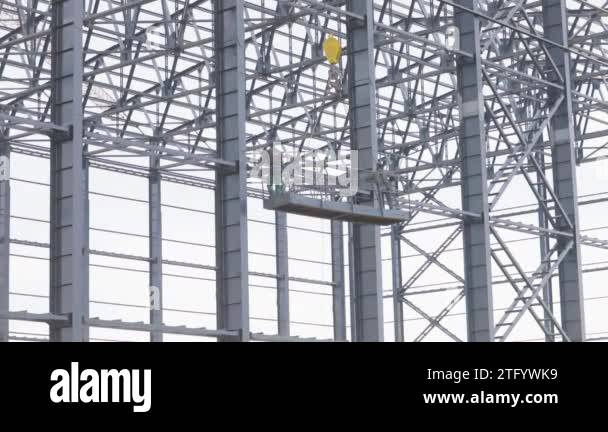 Construction of a large warehouse for a factory. Industrial exterior ...