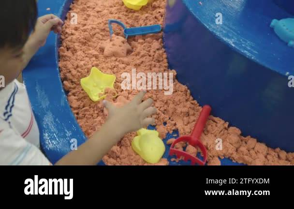 Happy Asian children having fun on entertainment center inflatable ...