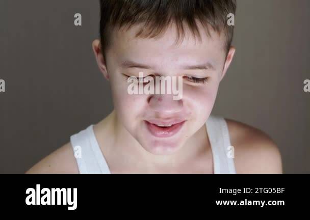 Close-up of a Face Profile of Talking Smiling Teenager Looking Down ...