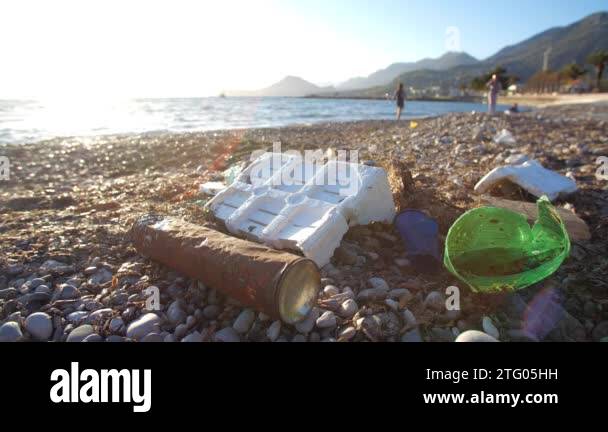 Ecological problem and environmental pollution concept. Scattered trash ...