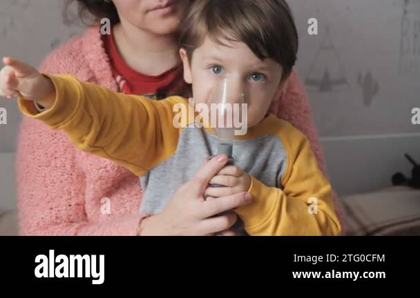 Treatment of the lungs and respiratory tract in children. The baby is ...