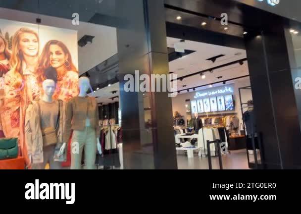 Guess Clothing store Shoes and jewelry showcase shop entrance Guildford ...