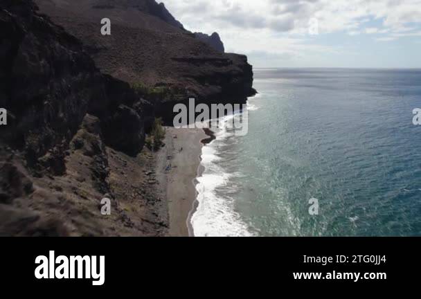Dark sand beach Playa de Guigui in west part of the Gran Canaria island ...