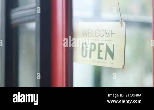 A signboard showing the opening and closing of the restaurant's service ...