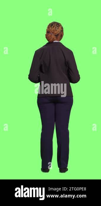 Vertical video: Female office worker with suit waiting in line on ...