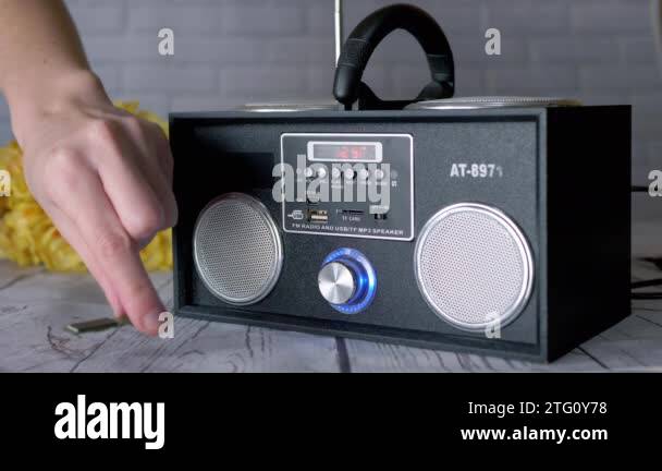 Female Hands Connecting a USB Flash Drive to the Connector of a Radio ...