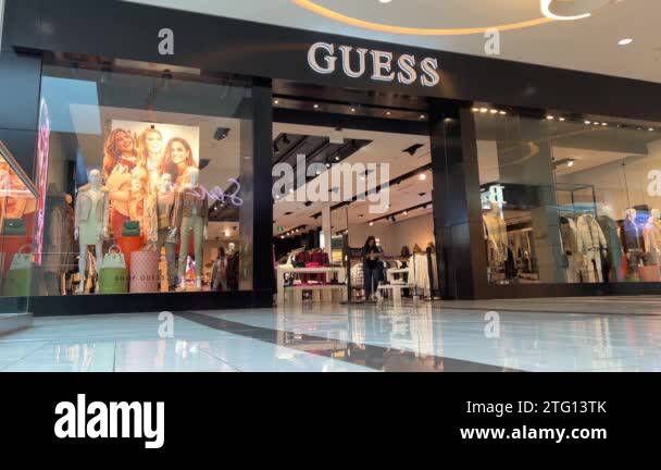 Guess Clothing store Shoes and jewelry showcase shop entrance Guildford ...
