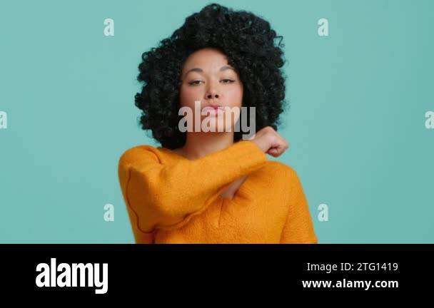 Calm angry African American lady show sign cut hand neck isolated blue ...