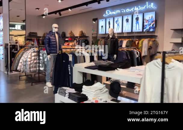 Guess Clothing store Shoes and jewelry showcase shop entrance Guildford ...