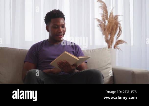 Home reading. Weekend leisure. Intelligent hobby. Relaxed smart smiling ...