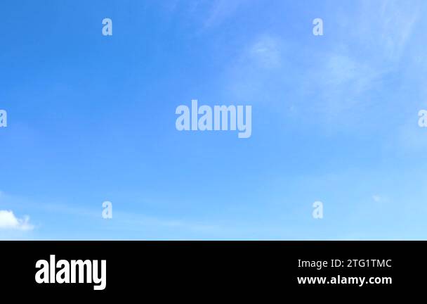 Beautiful sky with moving clouds background. Puffy fluffy white clouds. Cloud timelapse nature ...