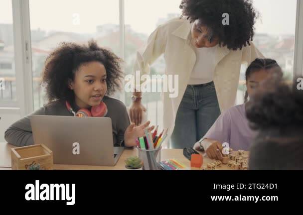 Classroom with diverse learners of happily African American students ...
