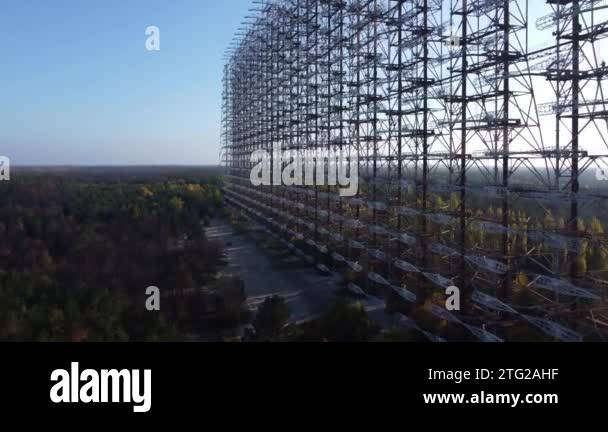 Drone filming at sunset with beautiful Duga radar lighting Stock Video ...