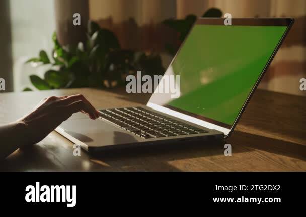 Close up of a caucasian woman hand entering the shot and swiping left ...