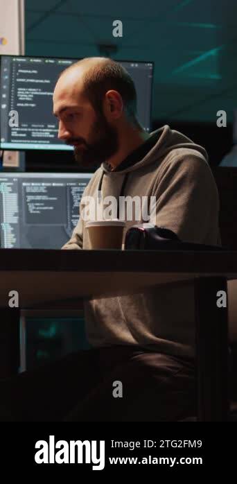 Vertical video: Software developer celebrating coding achievement and ... Vertical video: Software developer celebrating coding achievement and ...