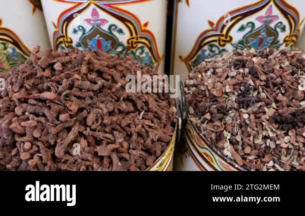 Natural organic turmeric curcuma roots and herbal tea mixture. Spice ...