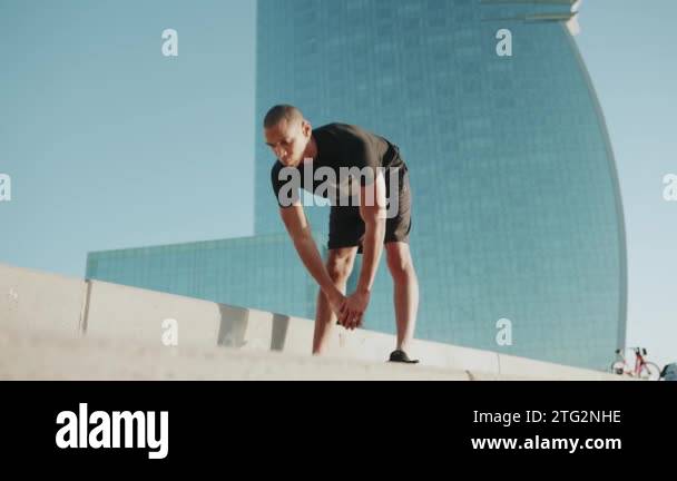 Concentrated african sportsman stretching Stock Videos & Footage - HD and 4K Video Clips - Alamy