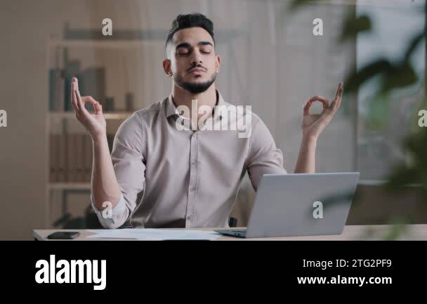 Calm arabian business man professional worker eyes closed taking break ...