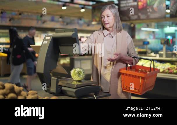 Senior woman at groceries store Stock Videos & Footage - HD and 4K ...