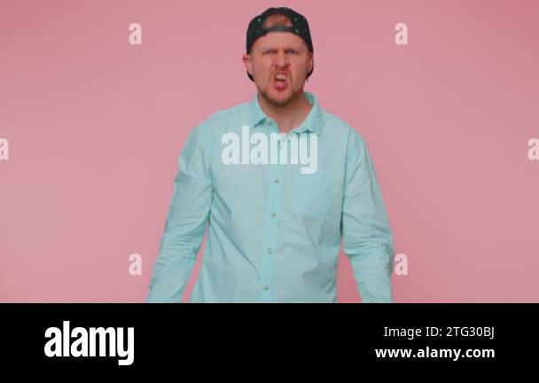 Aggressive hooligan man showing middle finger, demonstrating protest ...