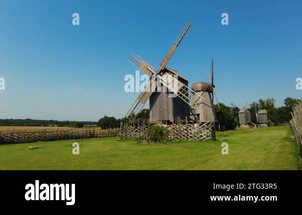 Antique wooden windmill. An old windmills in the countryside ...