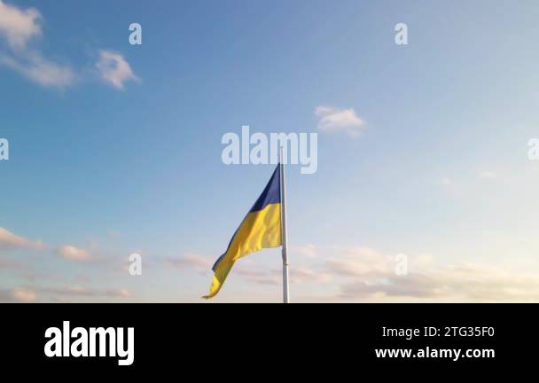 Highly detailed fabric texture flag of Ukraine. Slow motion of Ukraine ...