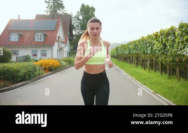 Happy pretty woman jogging Stock Videos & Footage - HD and 4K Video ...