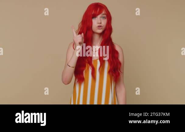 Displeased woman shakes finger and saying no, be careful, scolding and ...