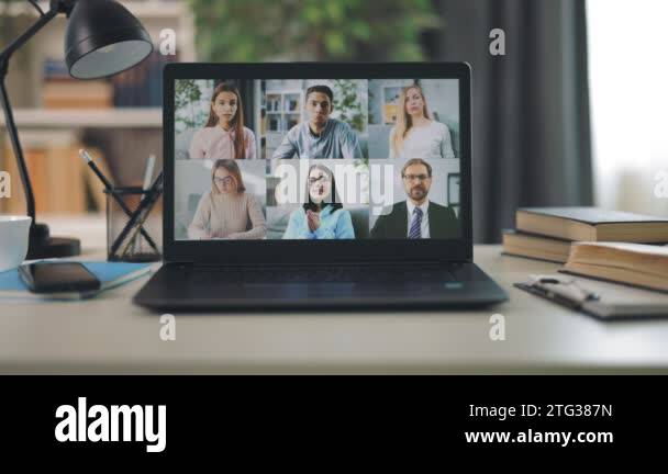 Modern portable laptop with group of corporate male and female ...