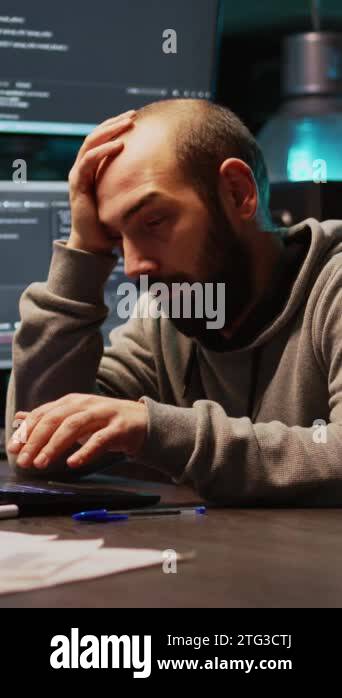Vertical Video Male Coder Feeling Sleepy And Working On Programming Code Typing Database