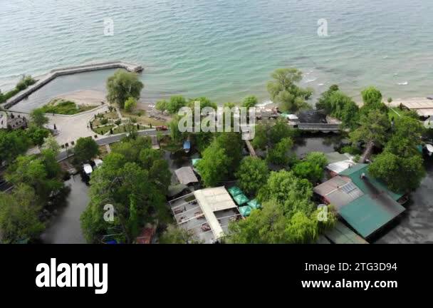 Drone shot of cafes and restaurants on the shores of Lake Ohrid. Drone ...
