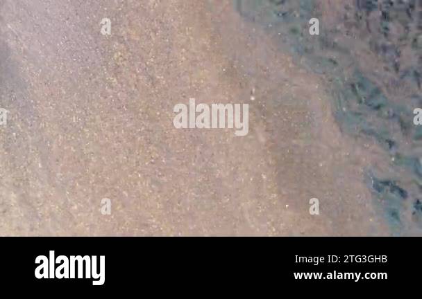 Liquid art with shimmering waves of sand and water. Smooth shiny wavy ...