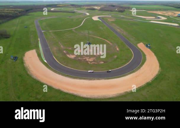 Cars racing circuit Stock Videos & Footage - HD and 4K Video Clips - Alamy