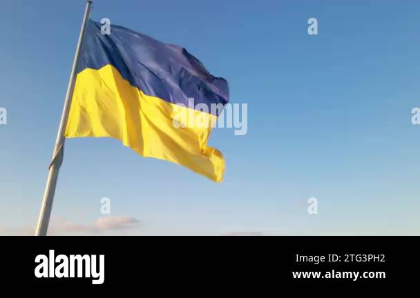 Highly detailed fabric texture flag of Ukraine. Slow motion of Ukraine ...