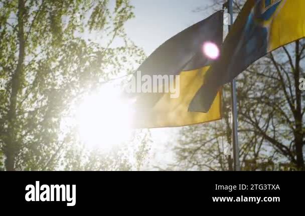 Slow motion of Ukraine flag waving background sky blue and yellow ...