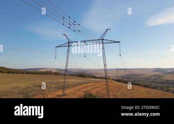 Electric power lines divided by safe guard insulating frame transfening ...