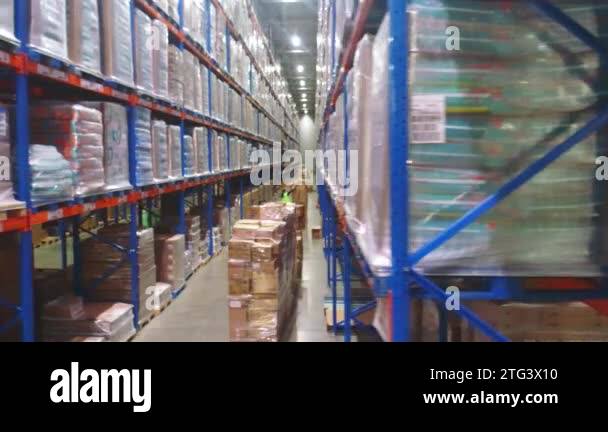 Modern forklift in a warehouse. Workflow in a modern warehouse. Large ...